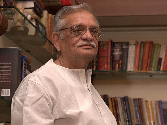 Collage of Gulzar’s works on stage in Dubai