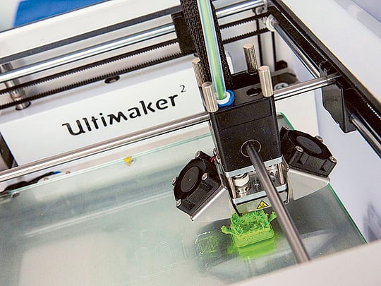 Handheld 3D bioprinter for treating serious burns