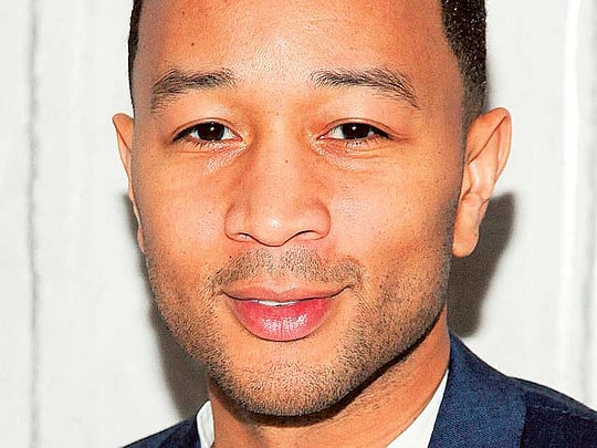 Singer John Legend opens Ohio theatre