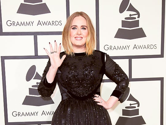 Adele calls out fans who throw things at artistes on stage