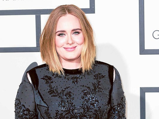 Has Adele shaved all her hair off in new picture?