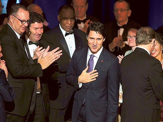 Canada PM walks different path from his father on deficit spending