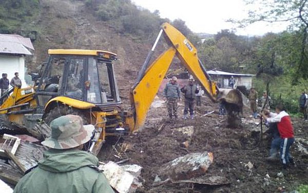 Mudslide buries workers' camp in India; at least 16 killed