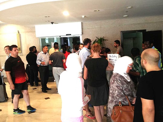 Fire-hit Dubai Marina tower residents anxious to return