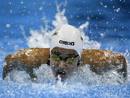 Syrian refugee swimmer Yusra Mardini wins her heat in Rio