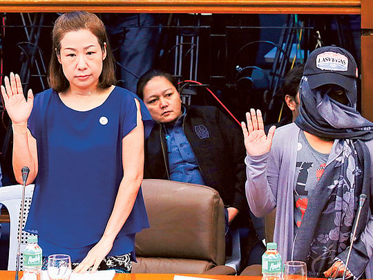 Rogue Philippine police transferred, not fired