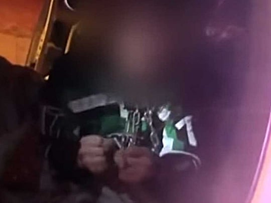 Police video shows rescue of kidnap victim bound by chains