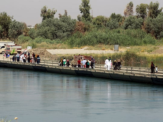 Iraqi bridge is sole link for Mosul residents rebuilding lives