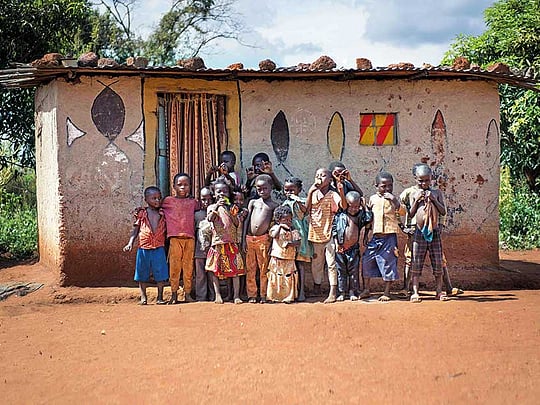 Painted huts offer DR Congo village a tourism lifeline