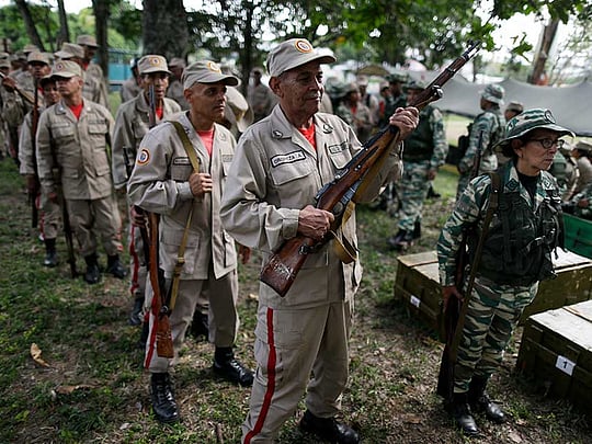 Venezuela shows off troops, weapons to defy Trump