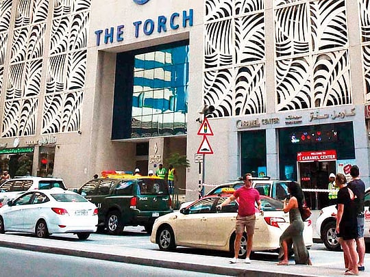 Fire-hit Dubai Torch Tower residents wait to go back in