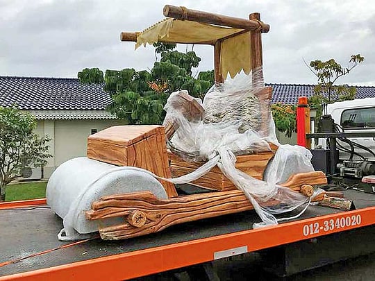 Yabba dabba doo! Malaysian sultan gets Flintstones car
