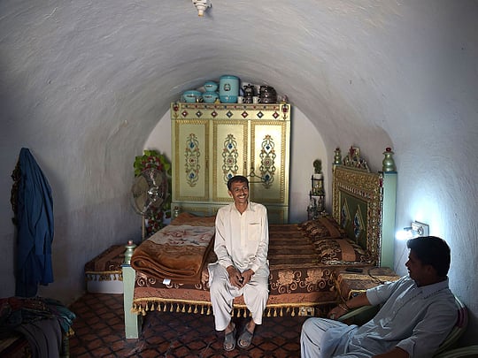 In this Pakistani village, home is where the cave is