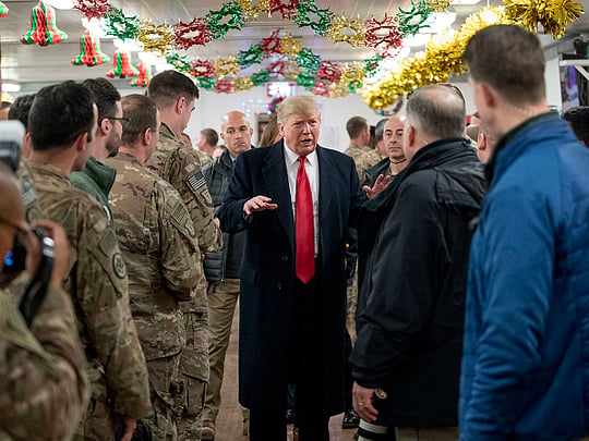 Donald Trump pays surprise visit to Iraq