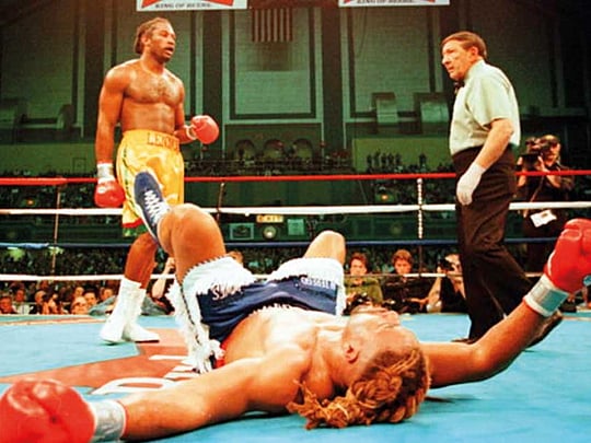 March 28, 1998: Lewis stops Briggs to keep title