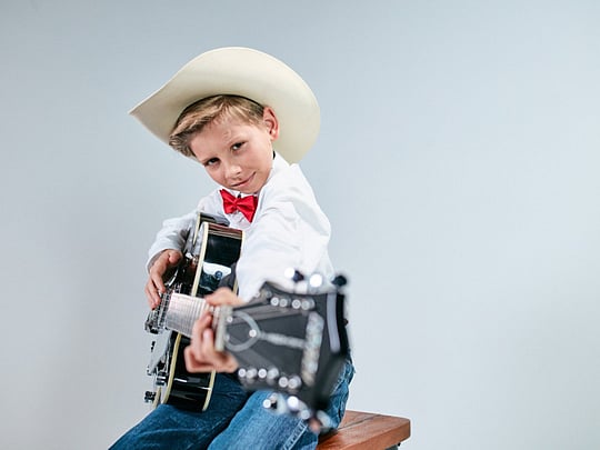 Internet famous yodelling kid wins music contract