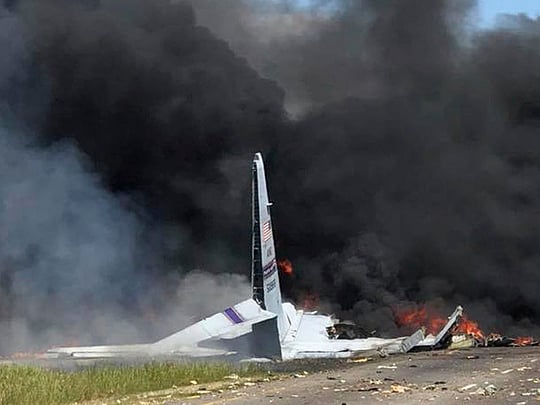 US military plane crashes on highway