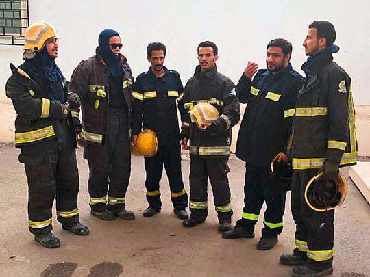 Saudi firefighters rescue family from burning flat