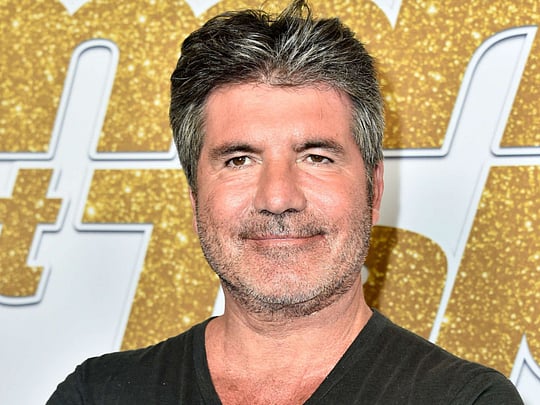 Hollywood: Simon Cowell recovering from six-hour surgery after bike ...