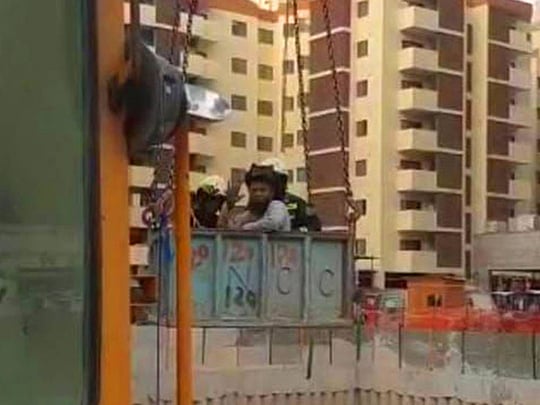 Dubai Police rescue crane operator