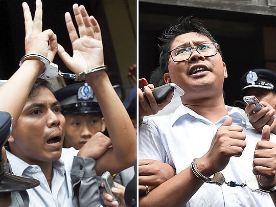 Myanmar judge jails Reuters reporters for 7 years in landmark secrets case