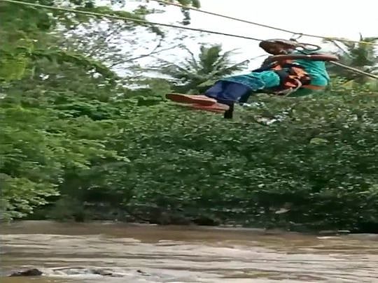 Video: Pregnant woman zip-lines to safety with her family in Kerala floods