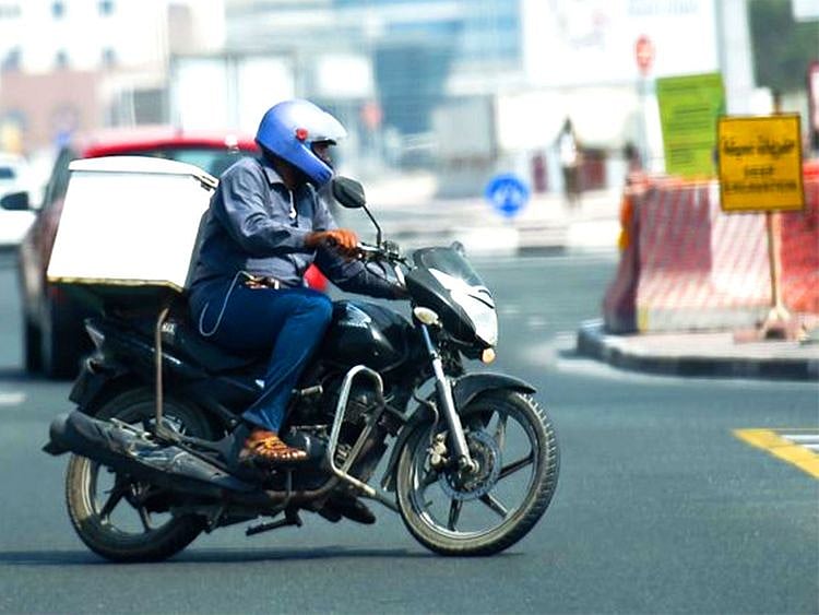 Safety Alert: Abu Dhabi Police Urge Delivery Riders to Pause in Rainy ...