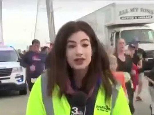 US: Runner apologizes for slapping reporter's rear on live TV