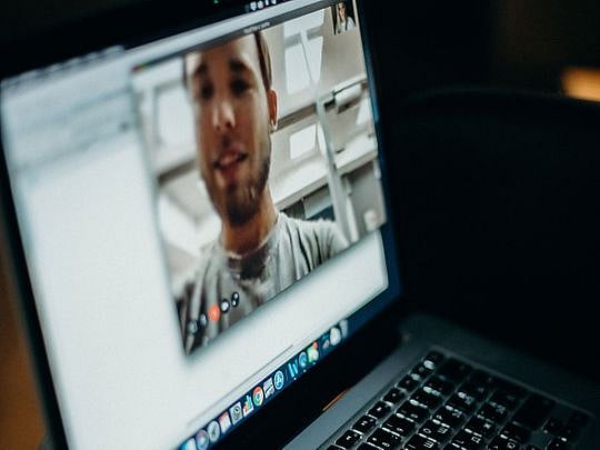 Science has an answer for why people still wave on Zoom calls