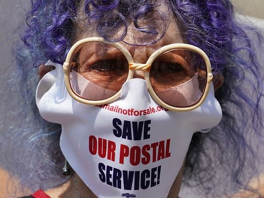Pictures: 'Save the Post Office' protest continues in US
