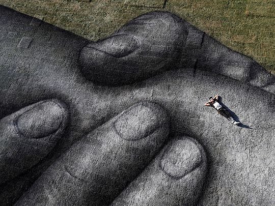 Photos: French artist paints giant biodegradable land art