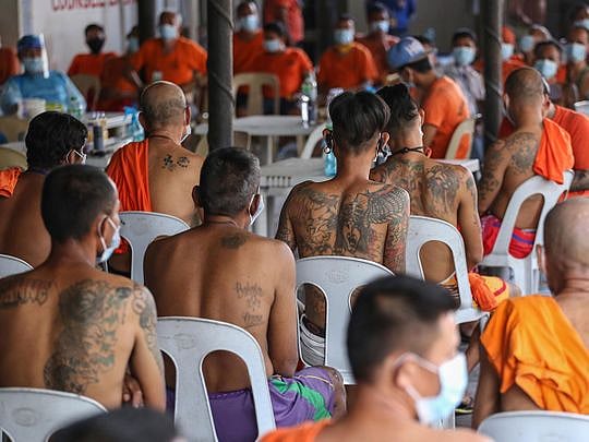 Philippine gangs ink over tattoos to combat jail violence