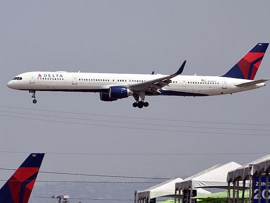 US: Delta plane with 147 passengers on board slides off taxiway amid ...
