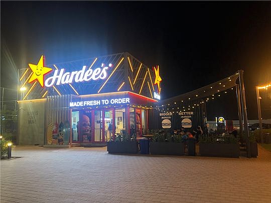 Be loud, proud, messy and go all in with Hardee’s