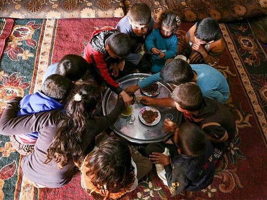 Syrian 'father of martyrs' raises orphaned grandchildren