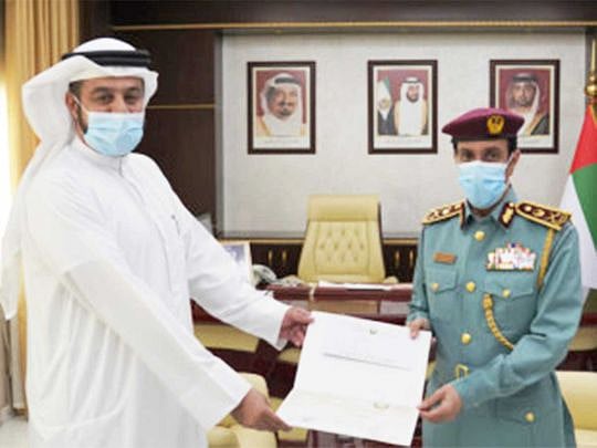Ajman Police chief honours officer for battling car fire on Dubai highway
