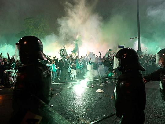 Sporting’s title celebrations marred as fans clash with riot police in ...