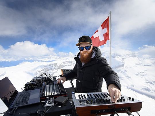 Photos: French techno musician rocks Swiss mountain tops