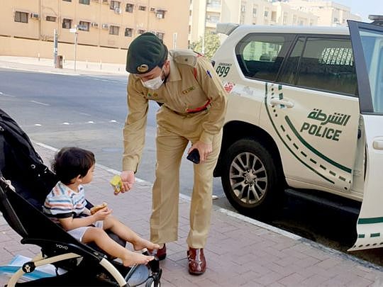 Watch: Child who waved at Dubai Police patrol receives a joyful surprise