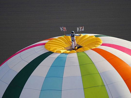 Photos: French daredevil breaks world record for standing on top of a ...