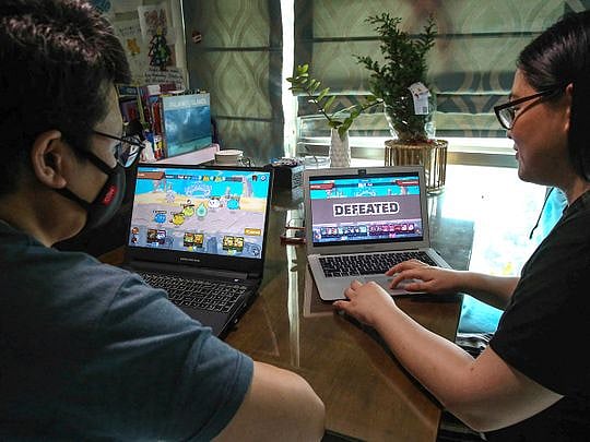 'Life-changing' or scam? Axie Infinity helps Philippines' poor earn