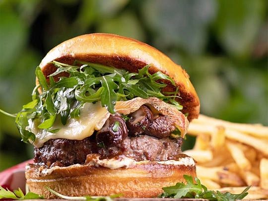 Celebrate International Burger Day with a cheesy raclette recipe