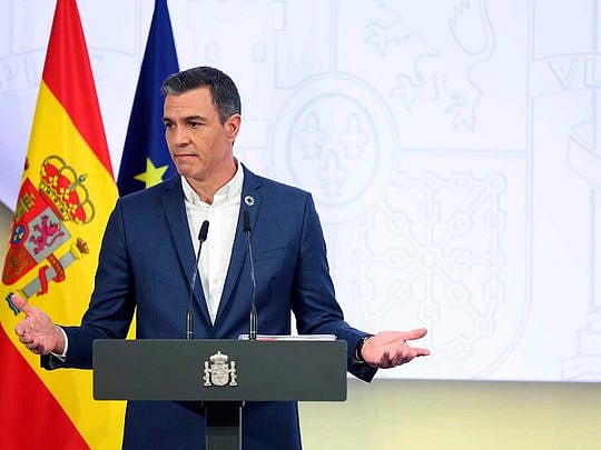 Stop wearing ties to save energy, Spanish Premier Sanchez says