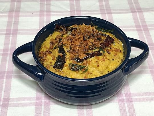 Watch how to make Kerala Mathanga-Kaya Erissery or pumpkin and banana curry