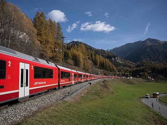 World’s longest passenger train winds through Swiss Alps