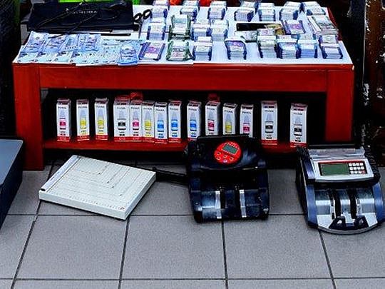 UAE: 8 men arrested in Sharjah for duping victims with fake cash