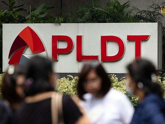 Philippine PLDT to cancel projects to cut $860m overspend