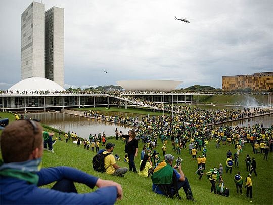 Bolsonaro supporters storm Brazil's presidential palace, Congress and ...