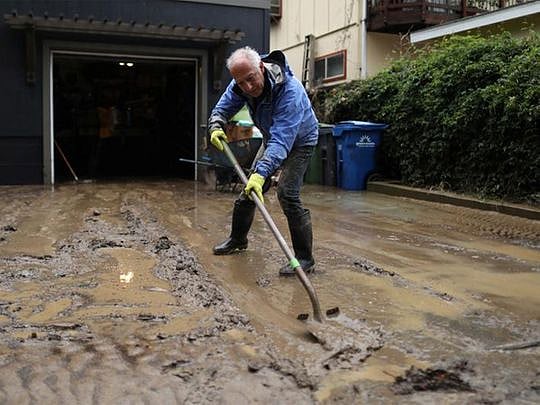 Photos: California cleans up debris from latest storm, braces for the next