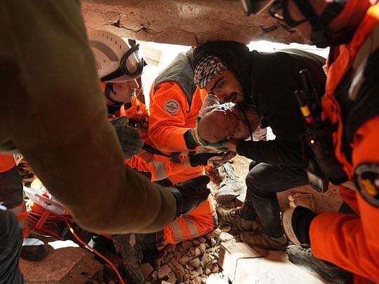 In a first, Swiss rescuers save quake victims abroad
